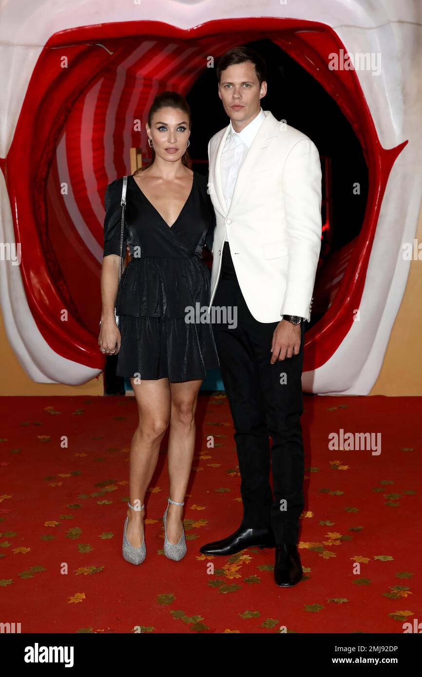 Actor Bill Skarsgard and partner Alida Morberg pose for photographers ...