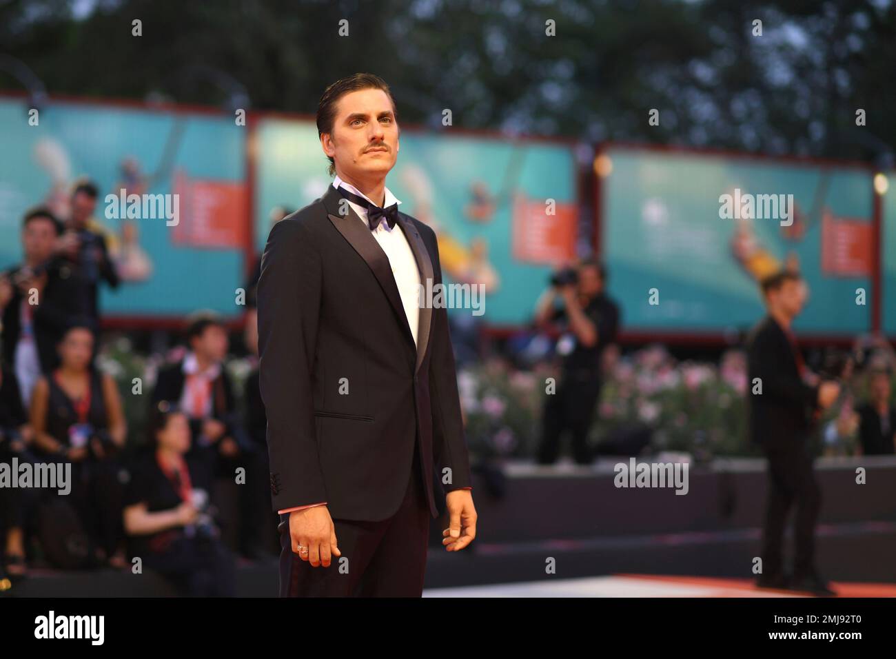 Actor Luca Marinelli poses for photographers upon arrival at the ...