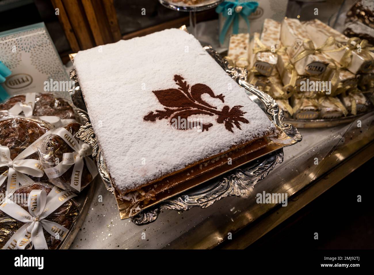 Typical Florentine sponge cake called "Schiacciata fiorentina" on a ...