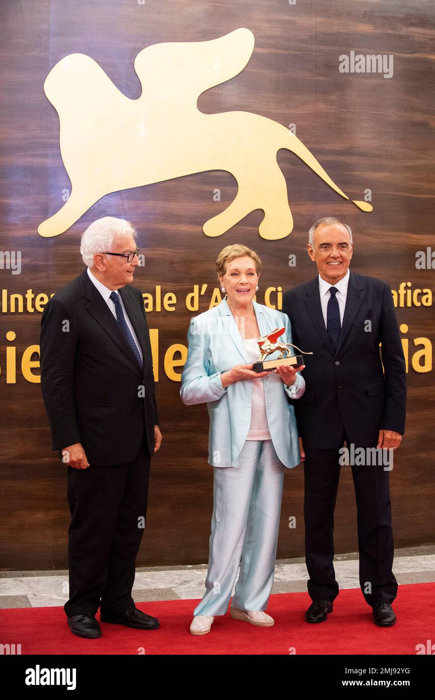 Paolo Baratta, from left, Julie Andrews and Alberto Barbera pose for ...