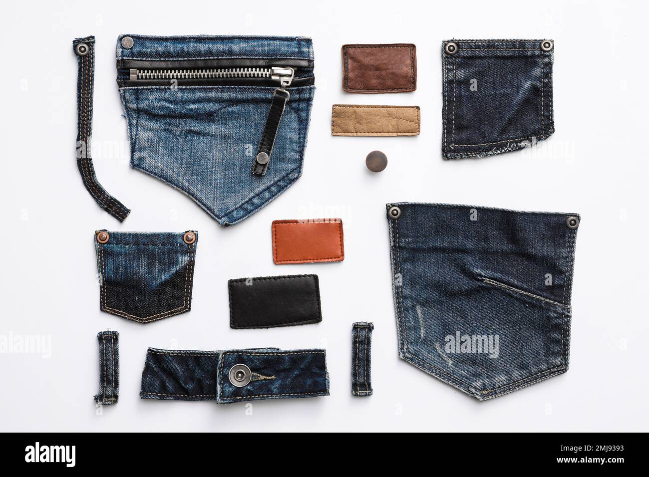 Composition with garment accessories and cutting details for jeans ...