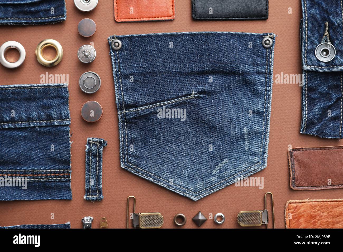 Flat lay composition with garment accessories and cutting details for ...