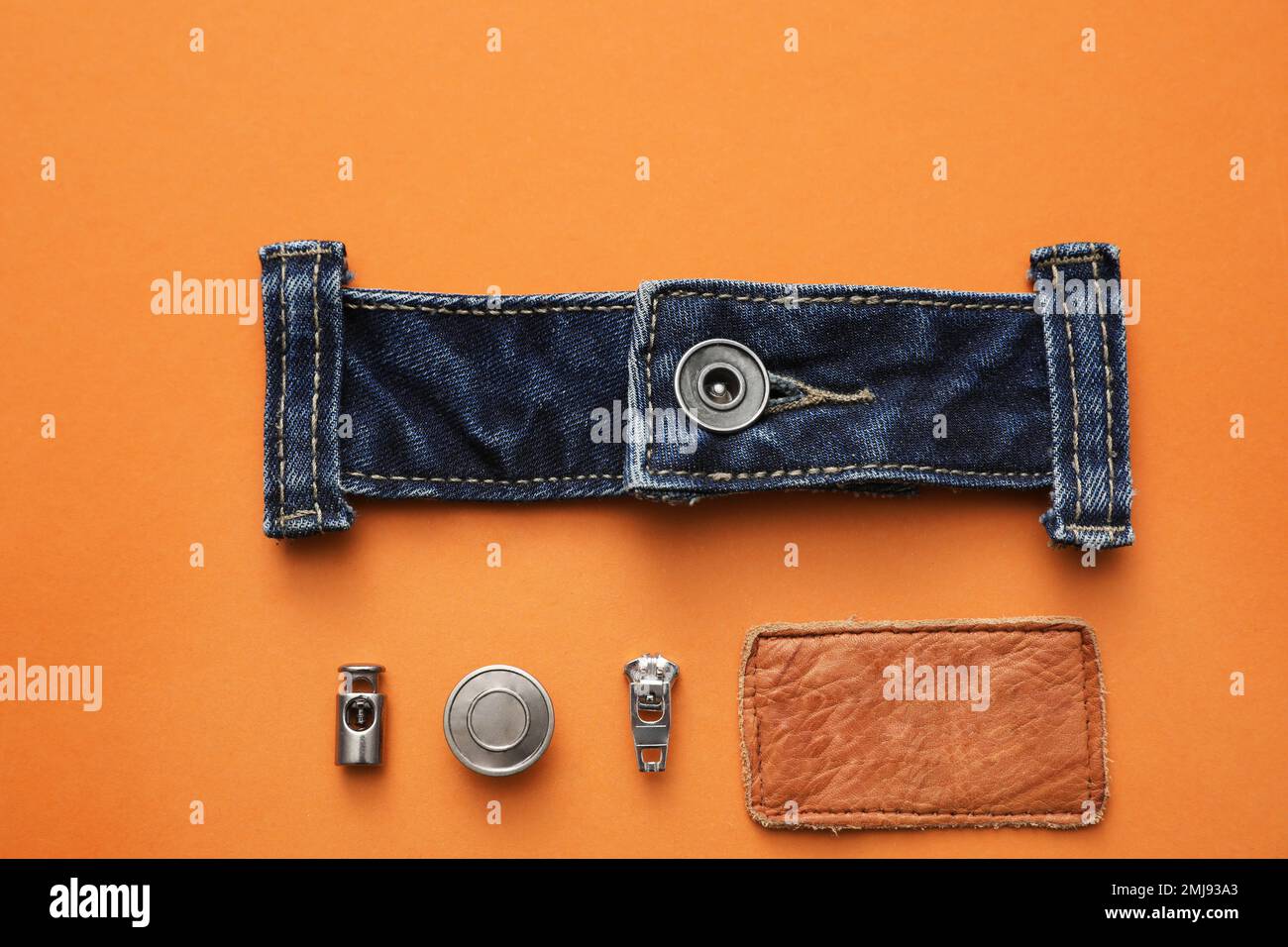 Flat lay composition with garment accessories and cutting details for ...