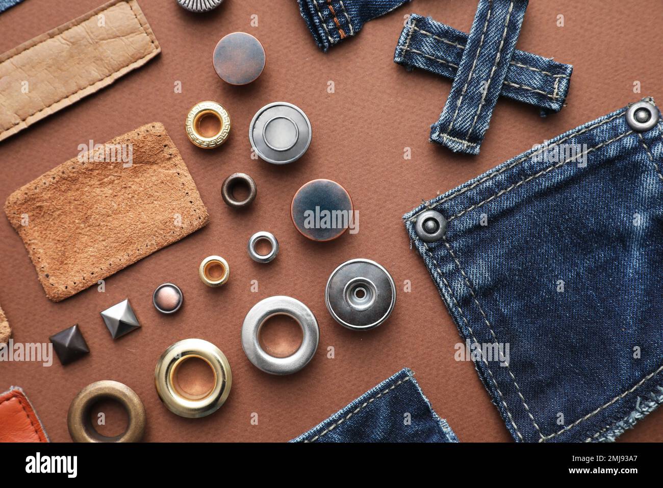Flat lay composition with garment accessories and cutting details for ...
