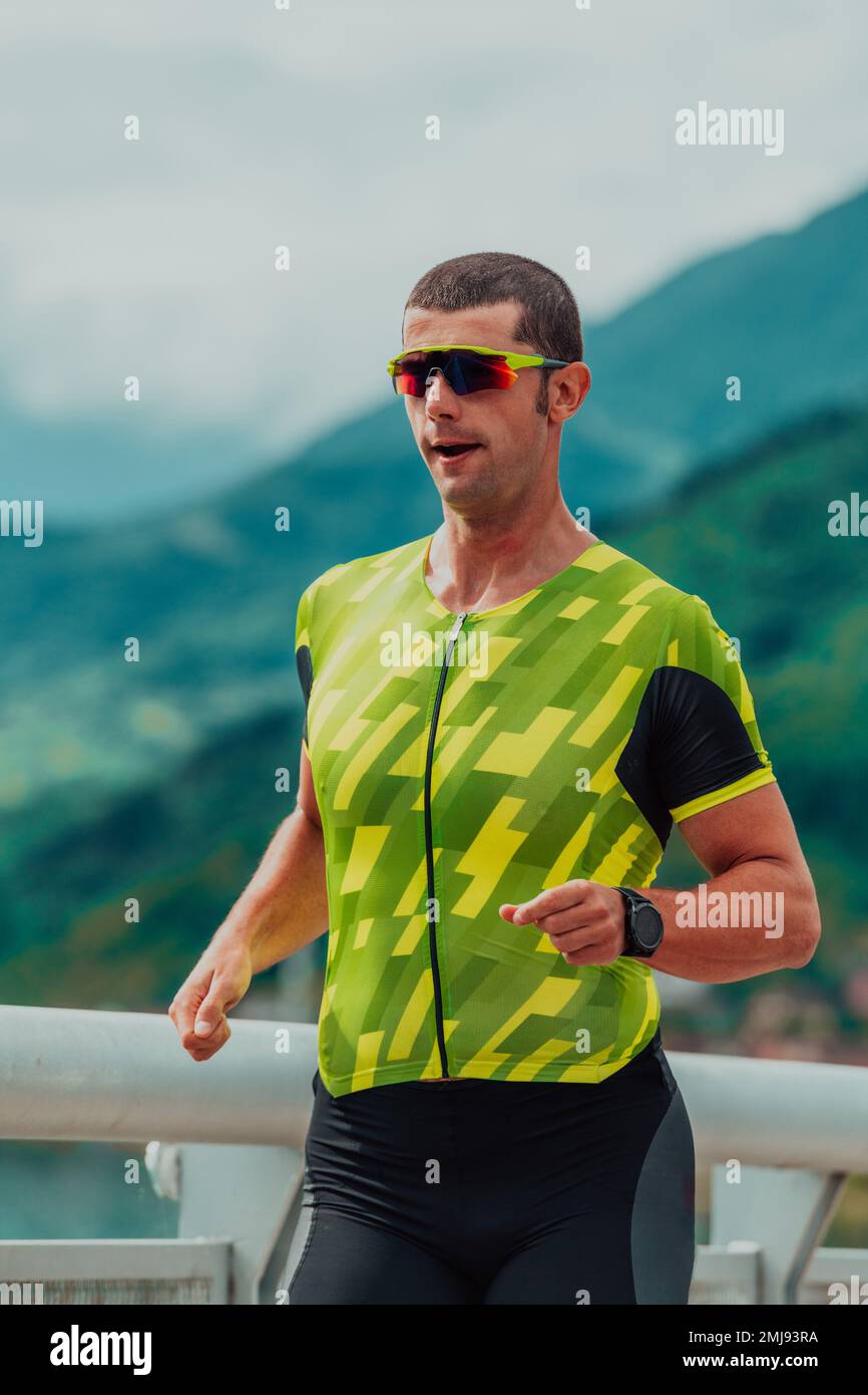 An athlete running a marathon and preparing for his competition. Photo ...
