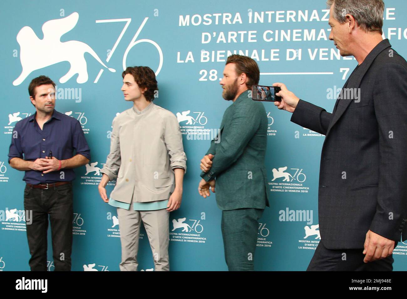 Actor Ben Mendelsohn, right, takes a photograph of director David ...