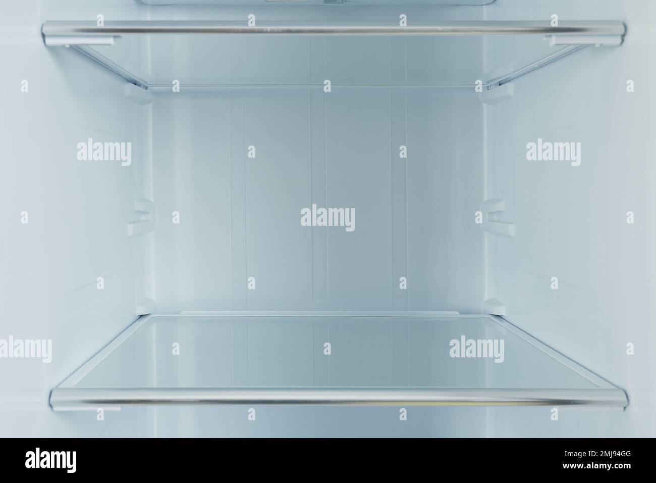 Shelves of empty modern refrigerator, closeup view Stock Photo - Alamy