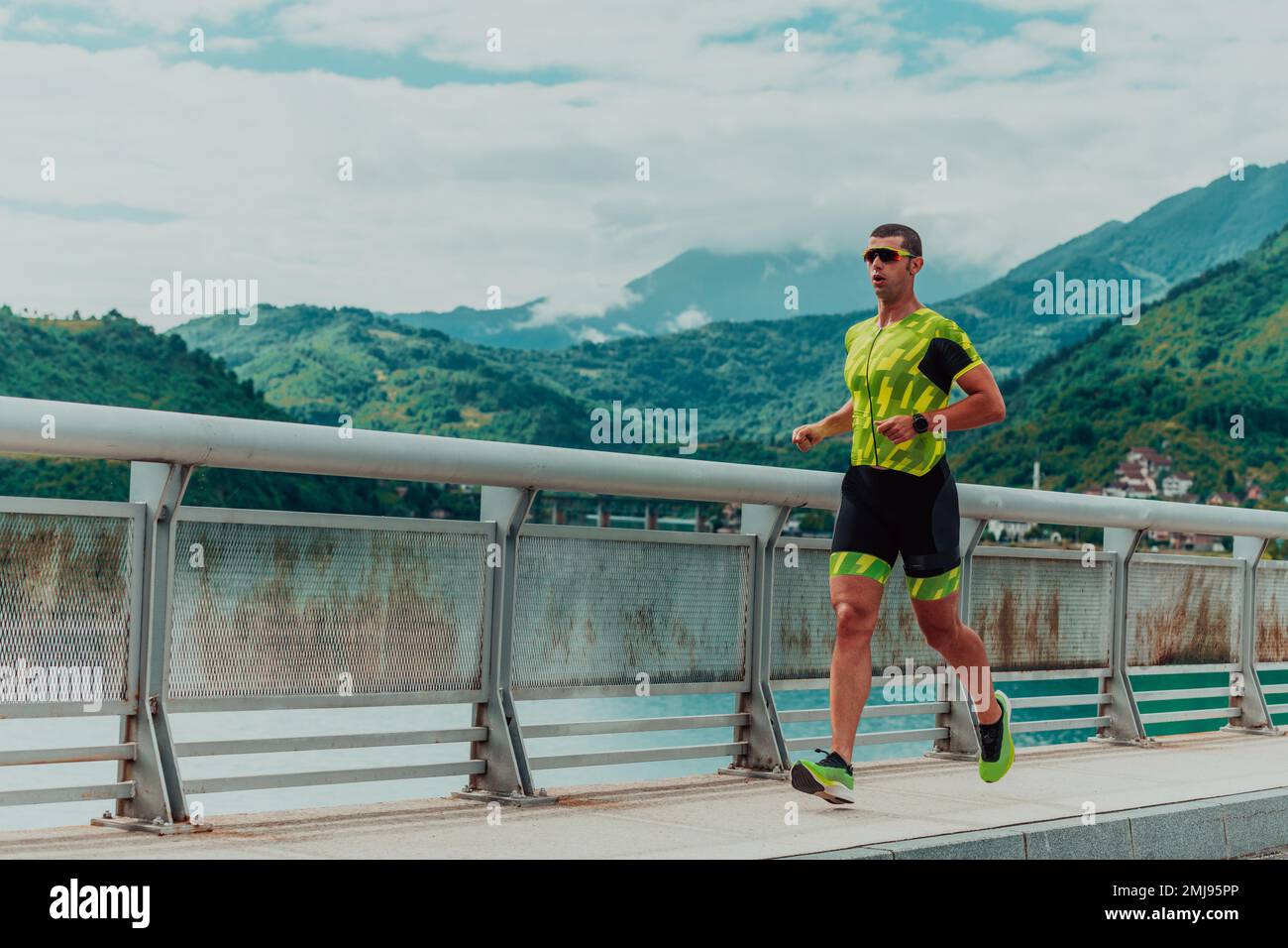 An athlete running a marathon and preparing for his competition. Photo ...