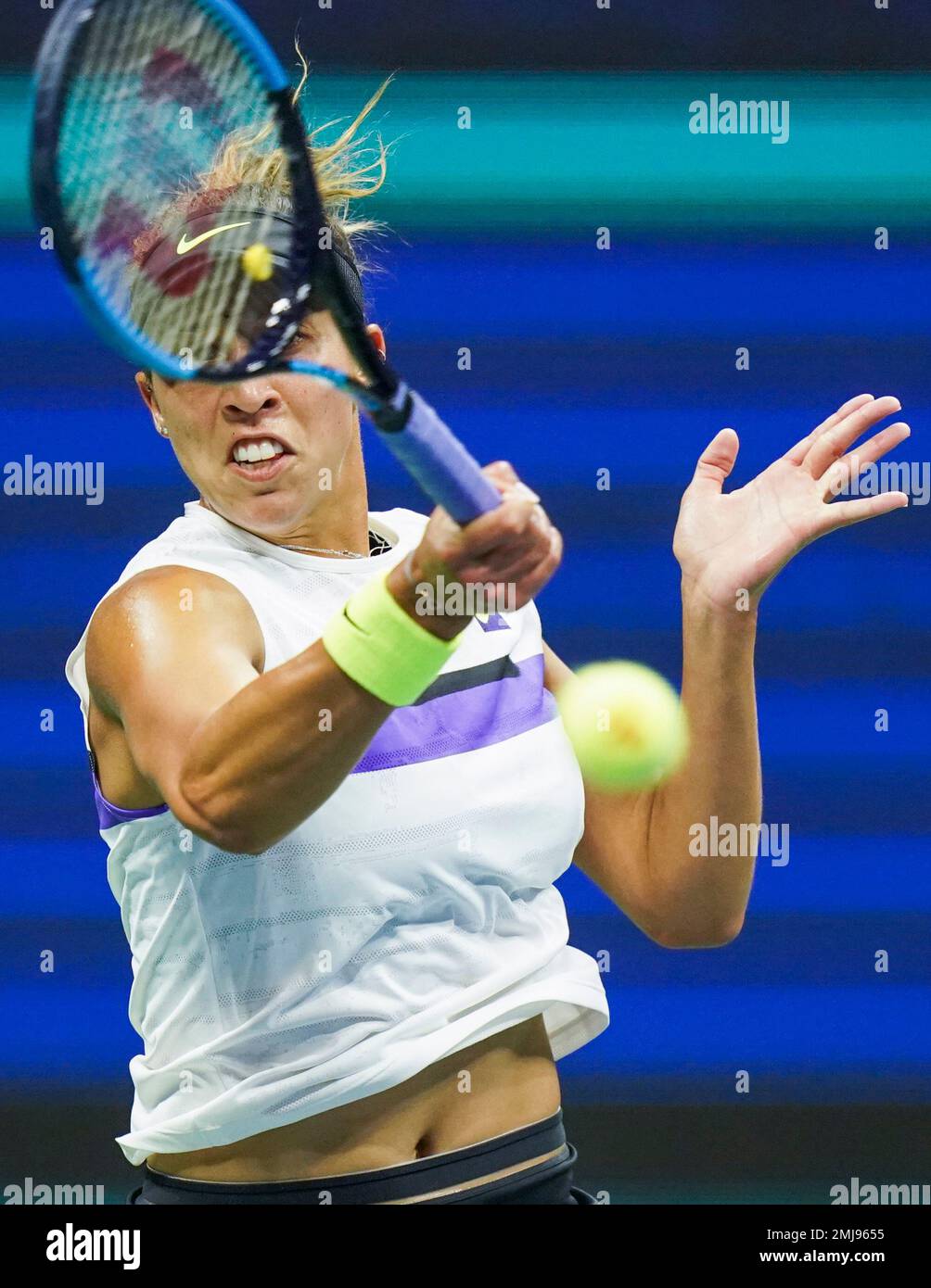 Madison Keys returns to Elina Svitolina, of Ukraine, during round four ...