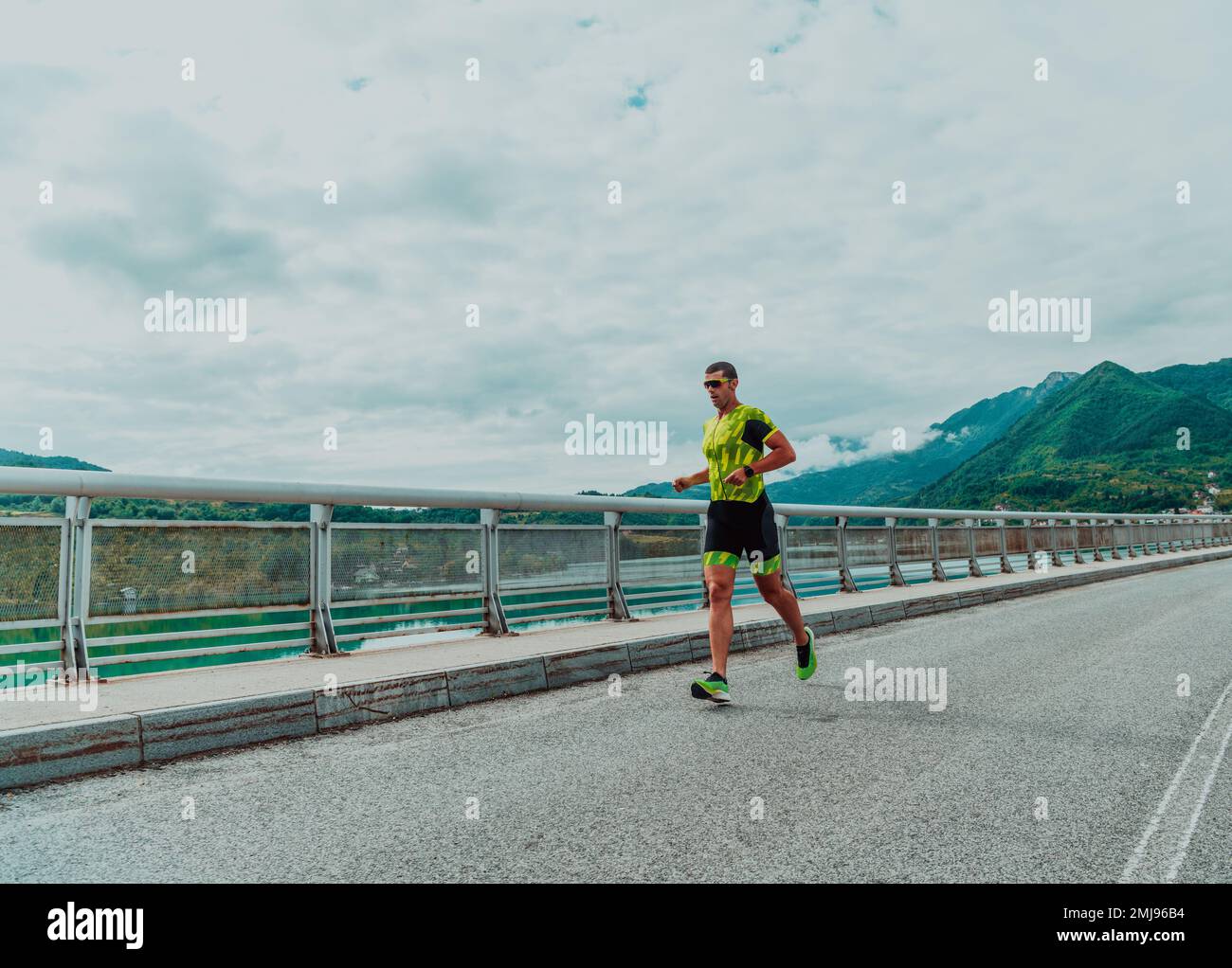 An athlete running a marathon and preparing for his competition. Photo ...
