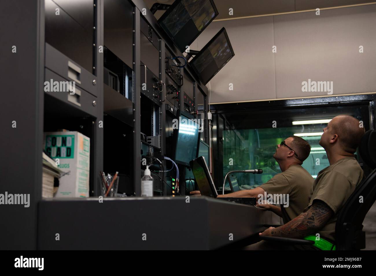 U.S. Air Force Staff Sgt. Dustin Chapman and Staff Sgt. Colby Barkdull ...