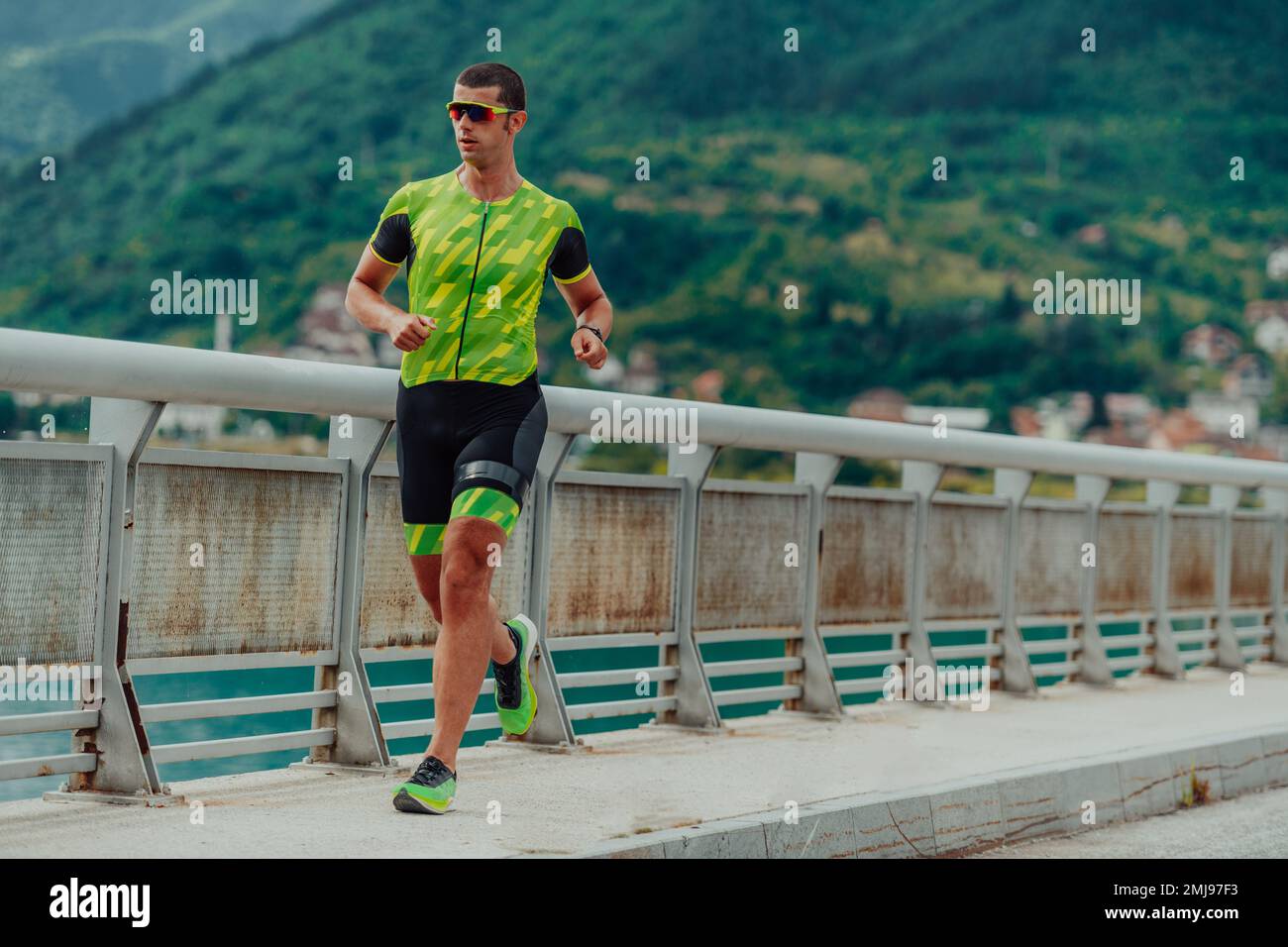 An athlete running a marathon and preparing for his competition. Photo ...
