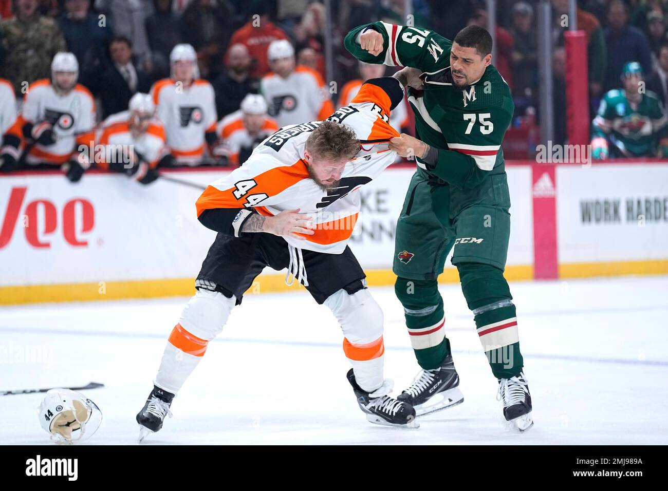 Philadelphia Flyers left wing Nicolas Deslauriers, left, and Minnesota ...