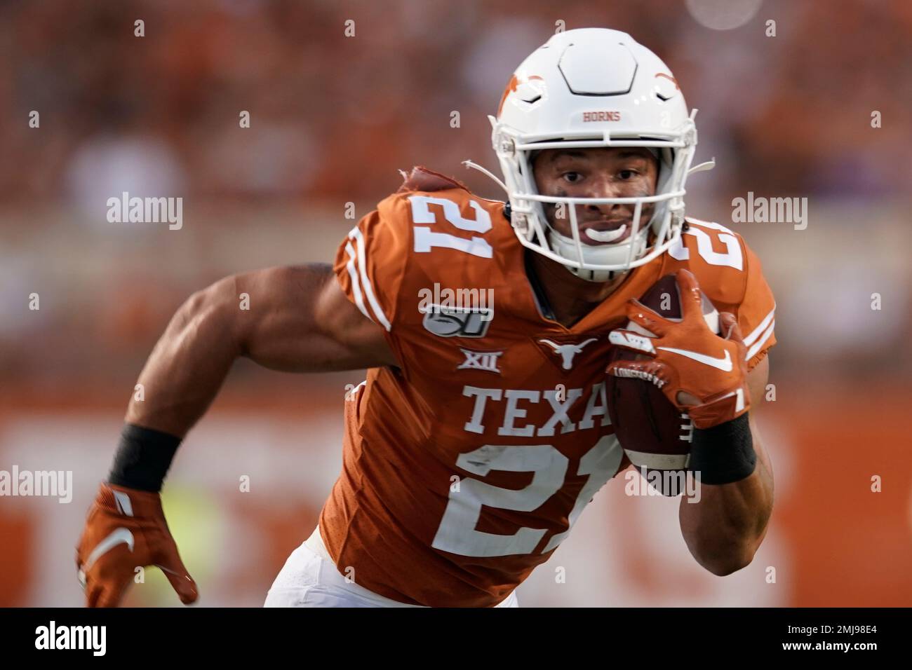 Texas's Jordan Whittington (21) runs against Louisiana Tech during the ...
