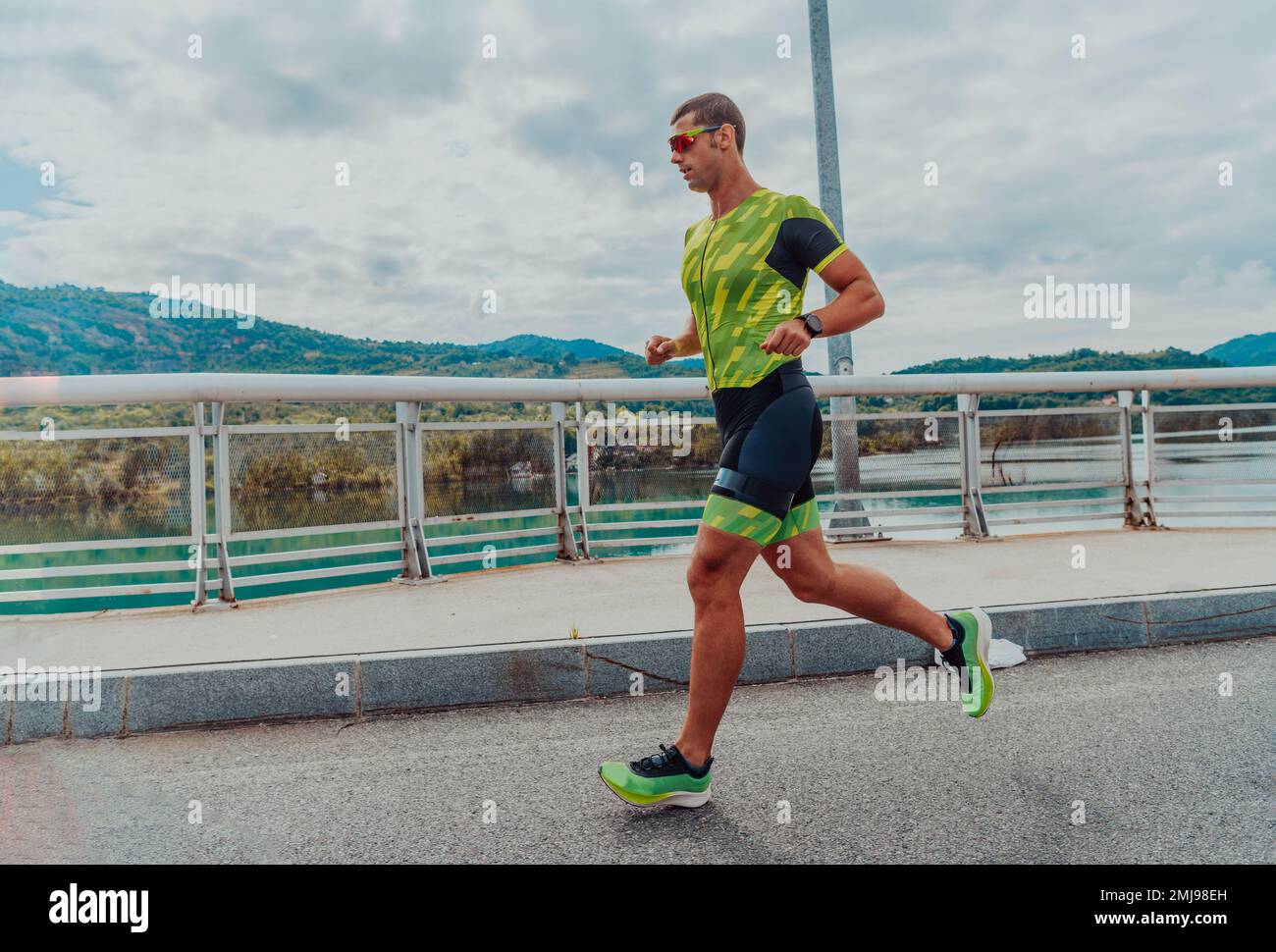 An athlete running a marathon and preparing for his competition. Photo ...