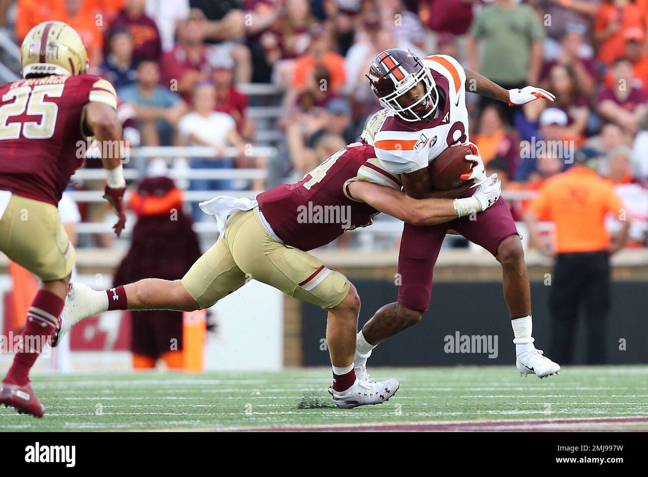 Virginia Tech wide receiver Phil Patterson (8) is tackled by Boston ...
