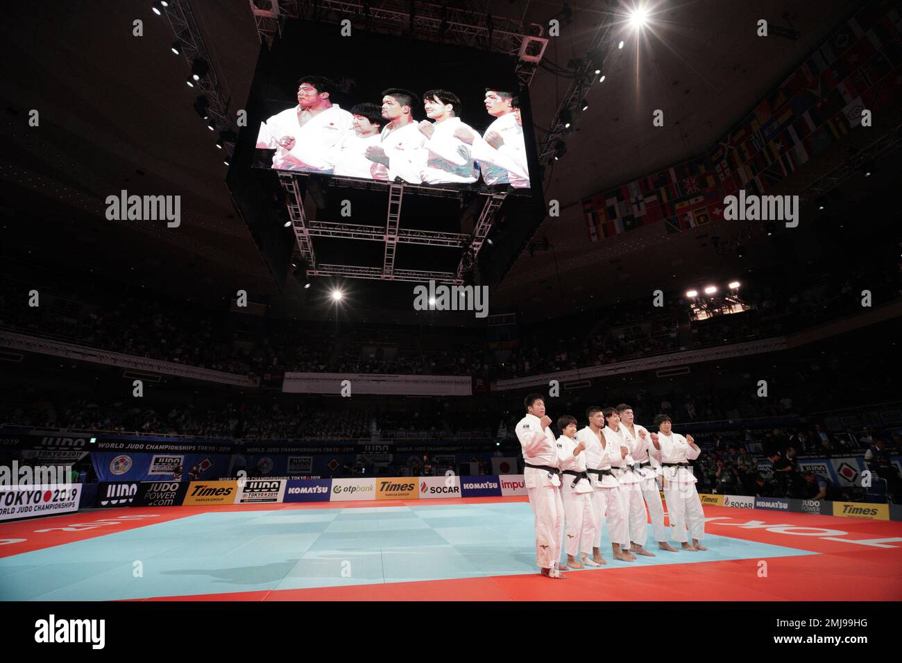 Players of Japan pose for photographers after beating France in the ...