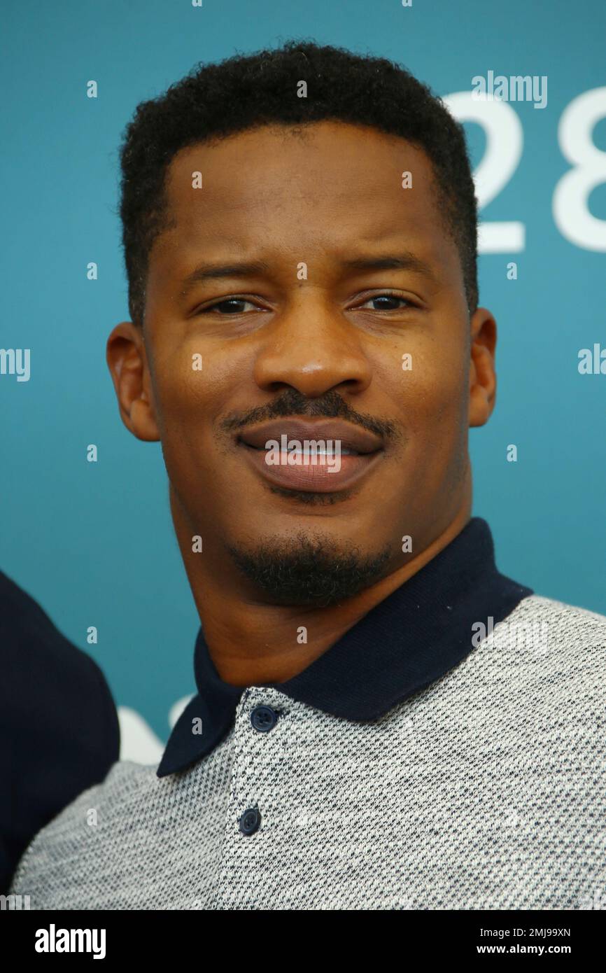 Director Nate Parker poses for photographers at the photo call for the ...