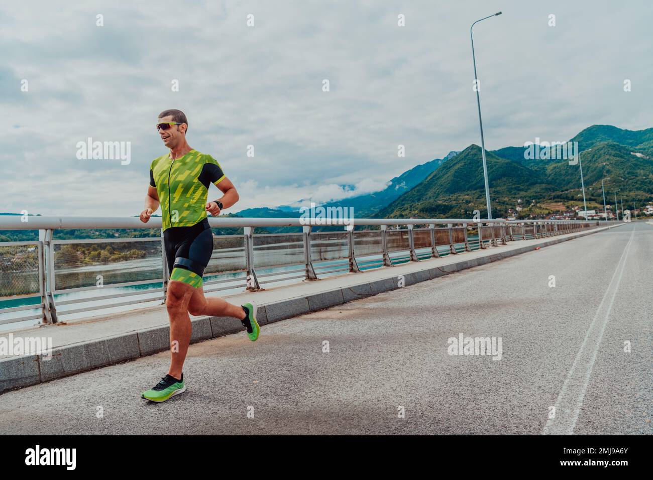 An athlete running a marathon and preparing for his competition. Photo ...