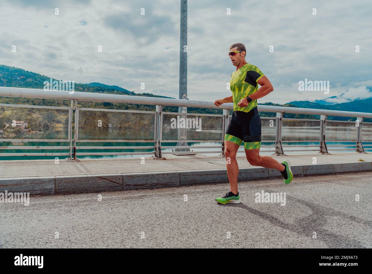 An athlete running a marathon and preparing for his competition. Photo ...