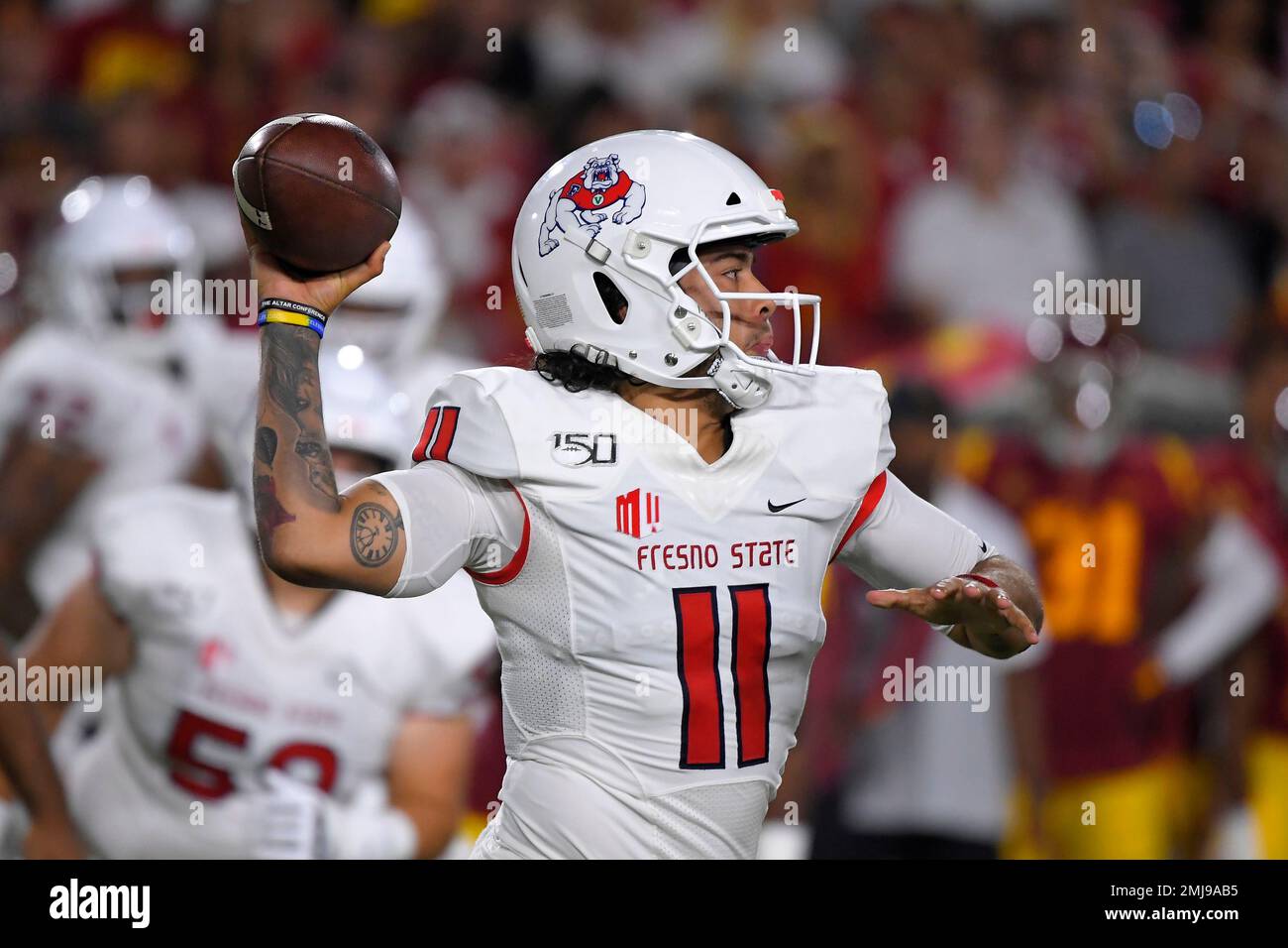 Fresno State quarterback Jorge Reyna passes during the first half of an ...