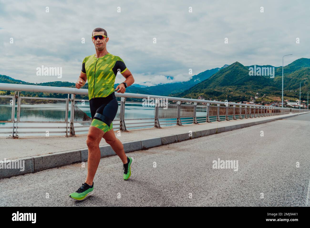 An athlete running a marathon and preparing for his competition. Photo ...