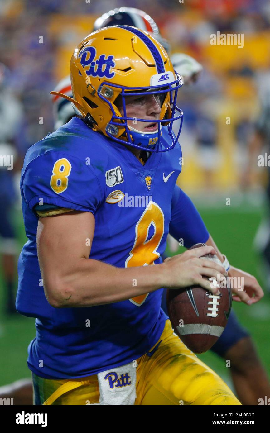 Pittsburgh quarterback Kenny Pickett (8) scrambles against Virginia n ...