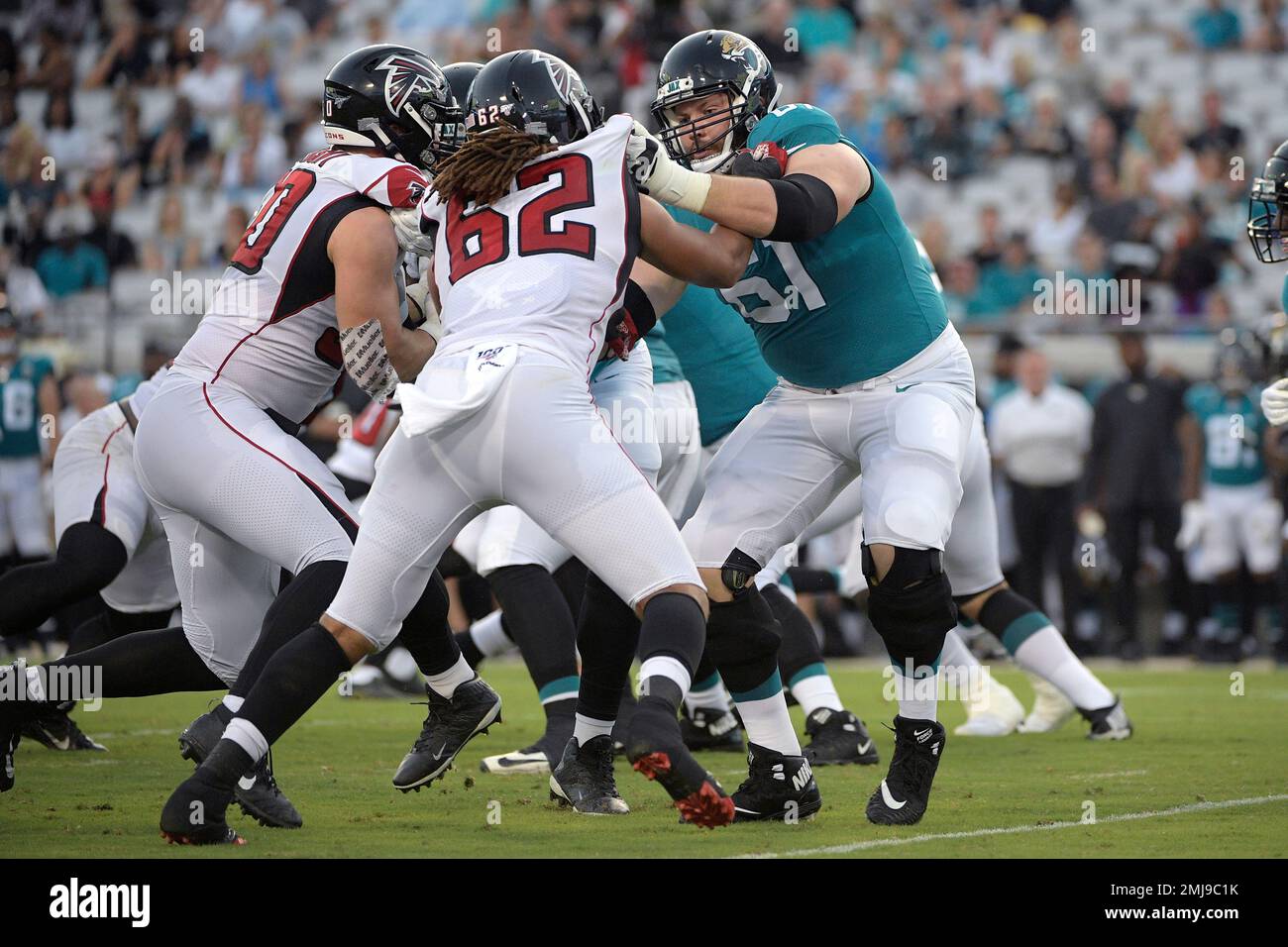 Jacksonville Jaguars offensive tackle Leonard Wester (61) blocks ...