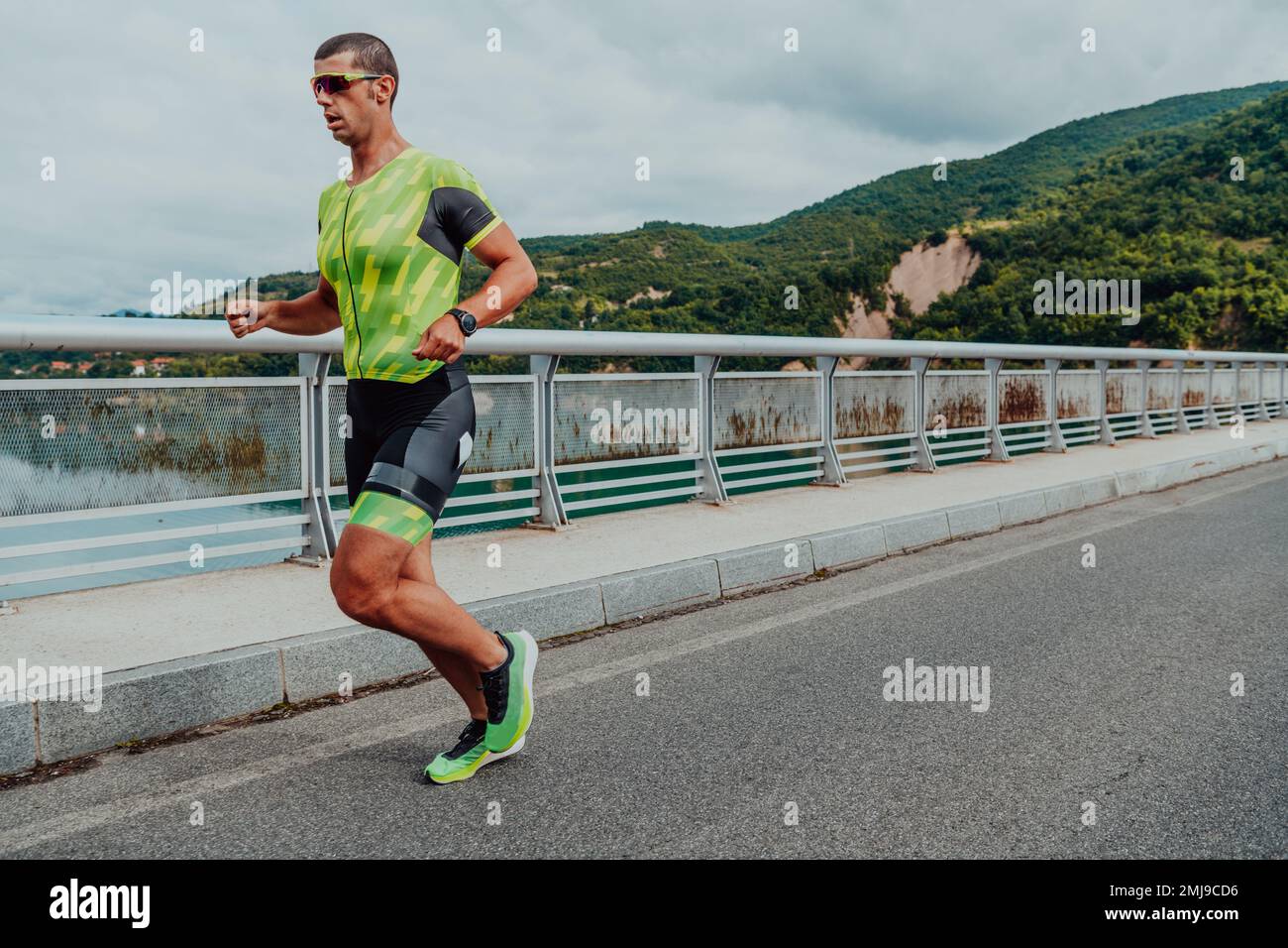 An athlete running a marathon and preparing for his competition. Photo ...
