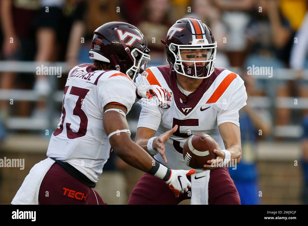 Virginia Tech quarterback Ryan Willis (5) fakes a handoff to running ...