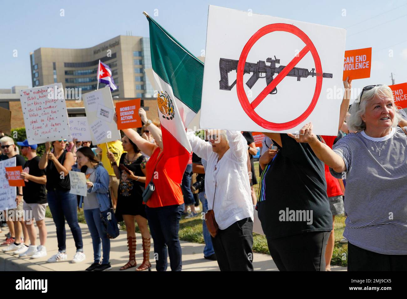 FILE - In this Aug. 7, 2019, file photo, demonstrators gather to ...