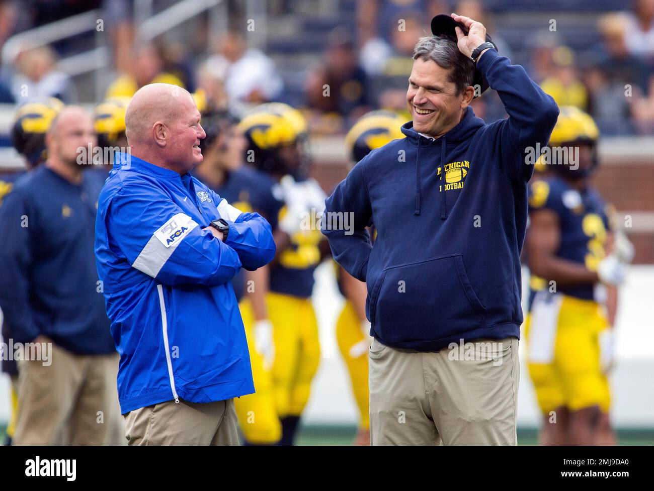Middle Tennessee head coach Rick Stockstill, left, shares a laugh with ...