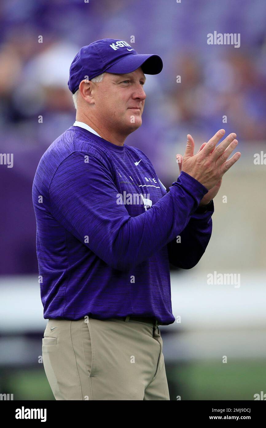 Kansas State coach Chris Klieman watches his team warm up for an NCAA ...