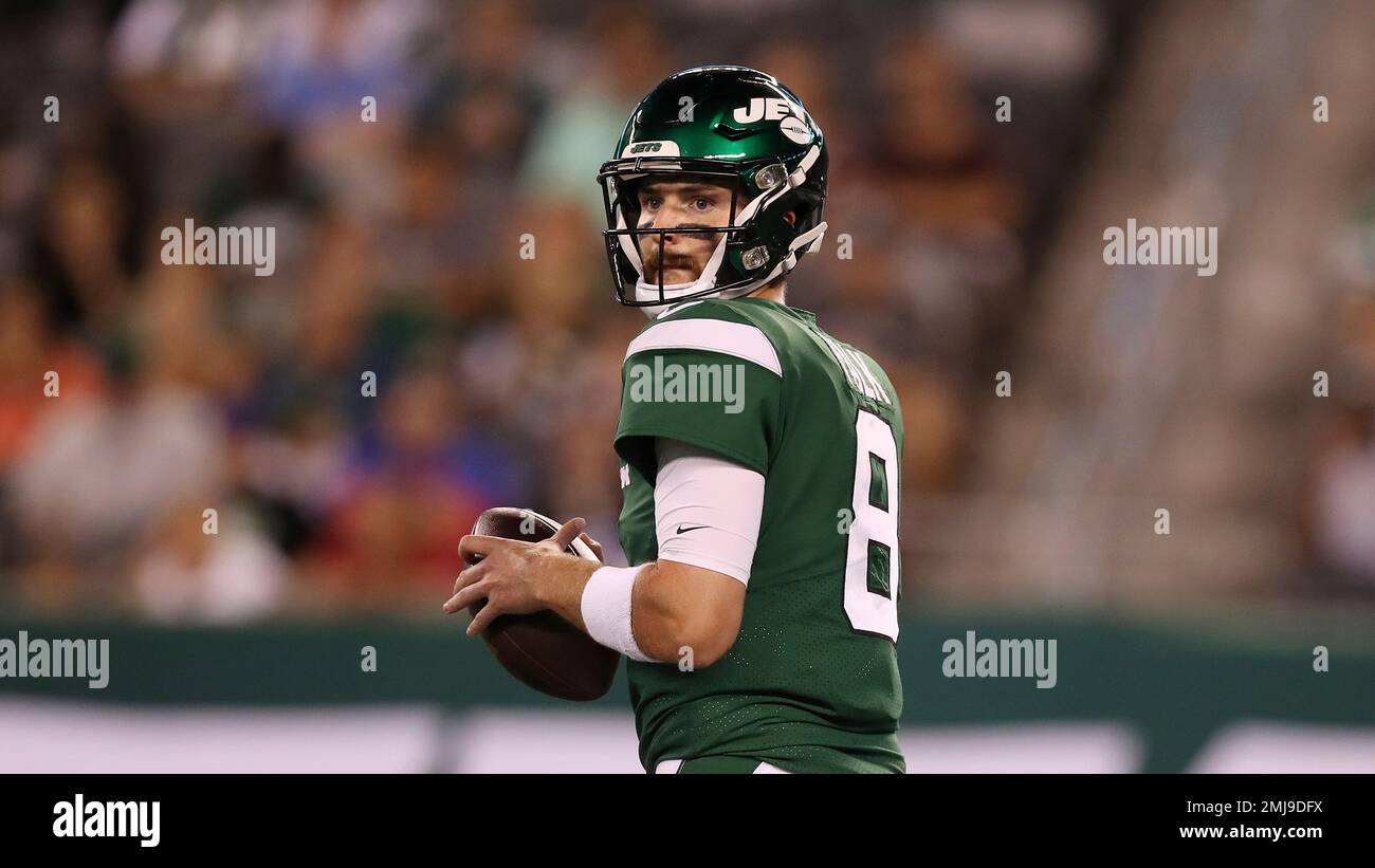 New York Jets quarterback Luke Falk (8) looks to make a pass during the first half of a ...