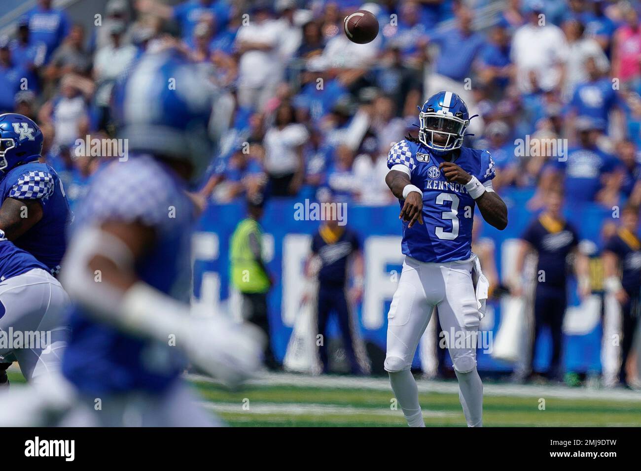 Kentucky quarterback Terry Wilson throws a pass during an NCAA college ...