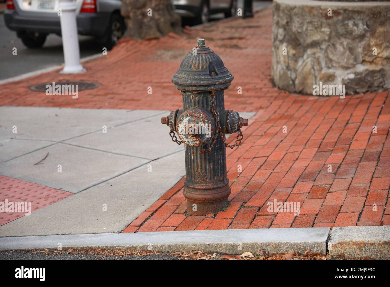 Old Fire Hydrant on the street stone cement sidewalk Stock Photo - Alamy