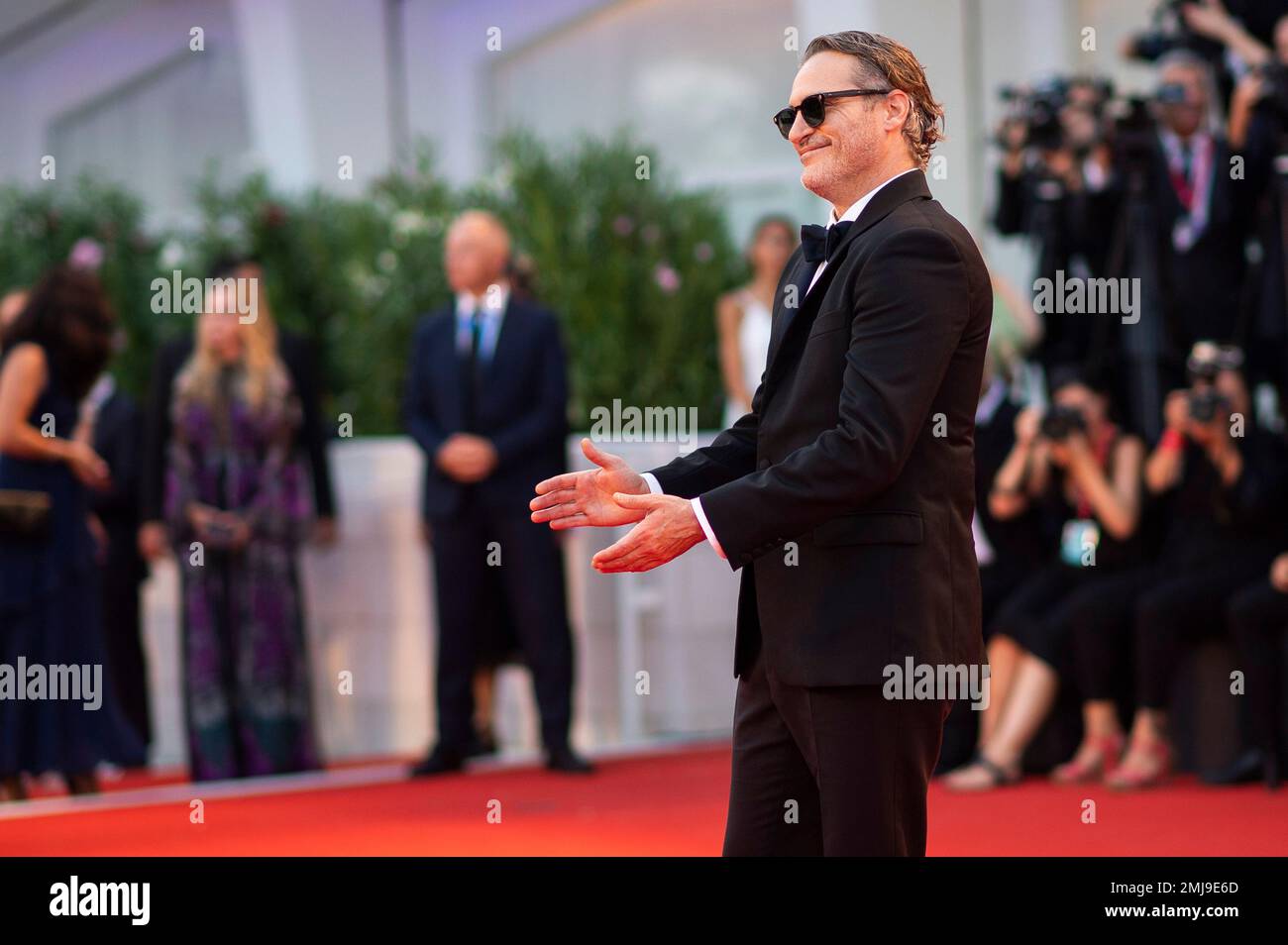 Actor Joaquin Phoenix poses for photographers upon arrival at the ...