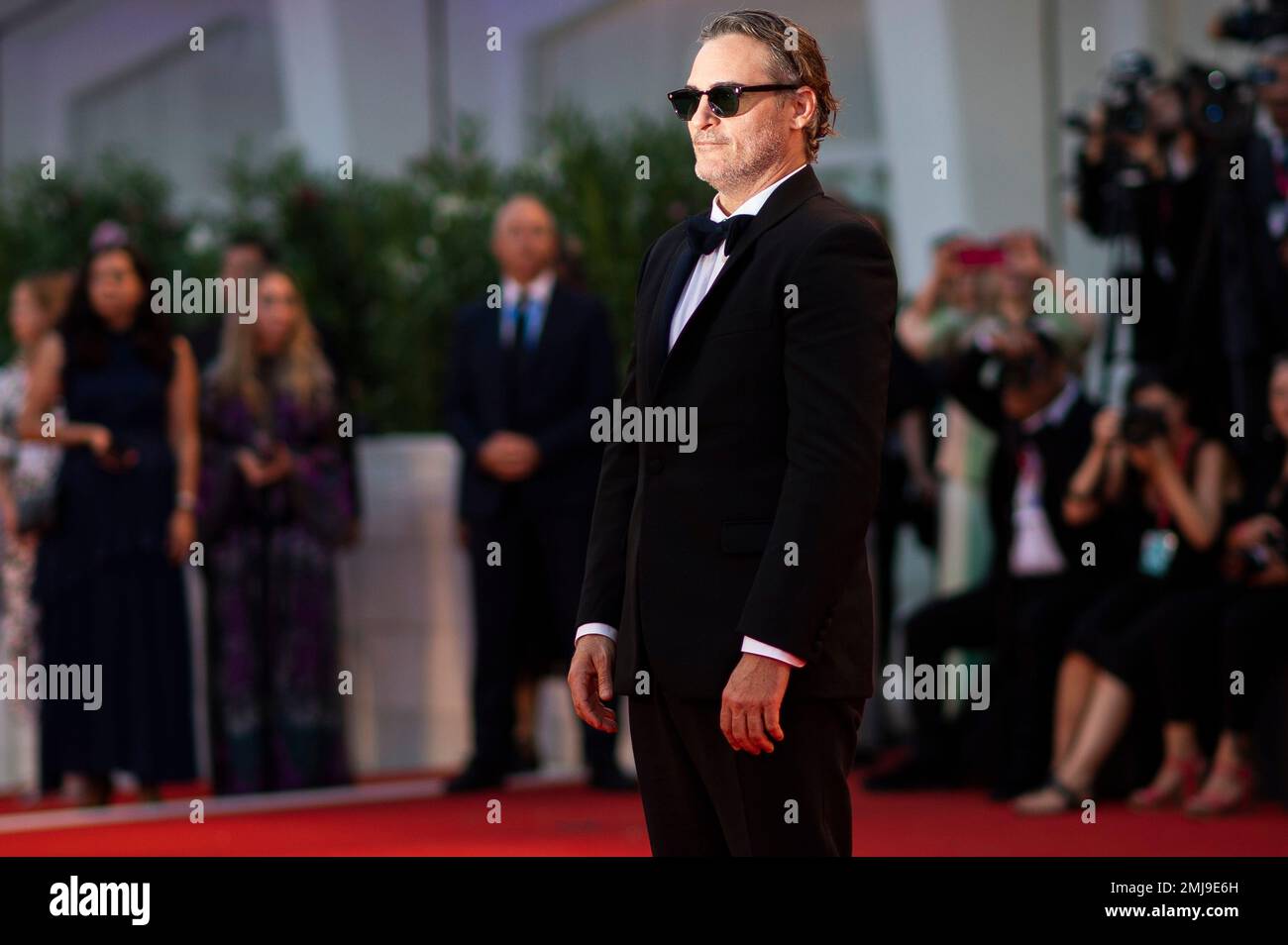 Actor Joaquin Phoenix poses for photographers upon arrival at the ...