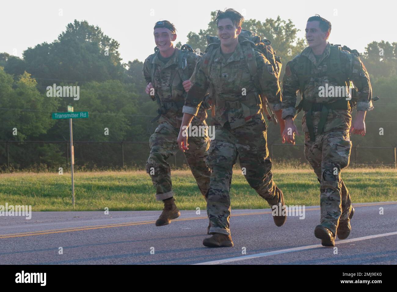 Soldiers cross the finish line of Soldiers the 12-kilometer (7.46 mile ...