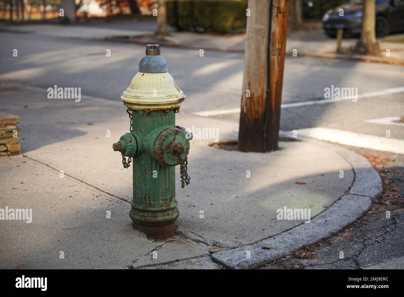 Old Fire Hydrant on the street stone cement sidewalk Stock Photo - Alamy