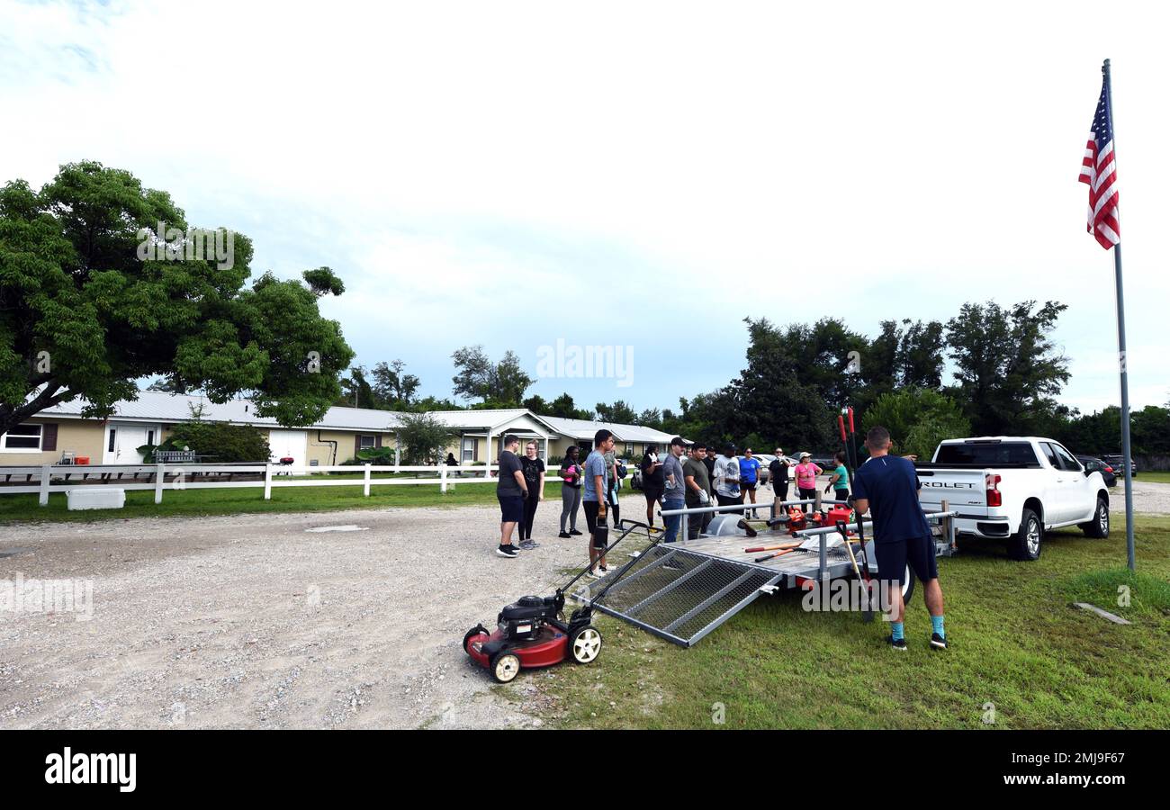 Members of Team Tyndall prepare to help with yard maintenance during a ...