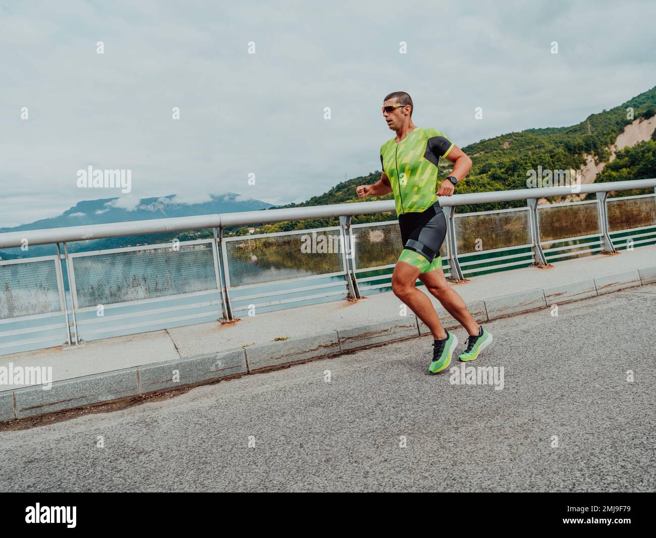 An athlete running a marathon and preparing for his competition. Photo ...