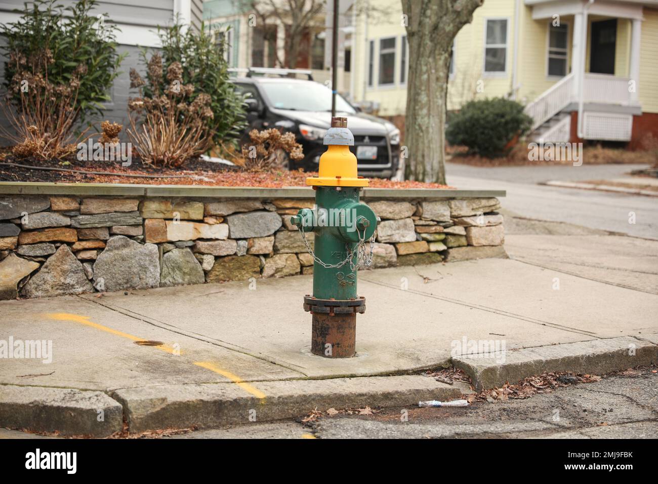 Old Fire Hydrant on the street stone cement sidewalk Stock Photo - Alamy