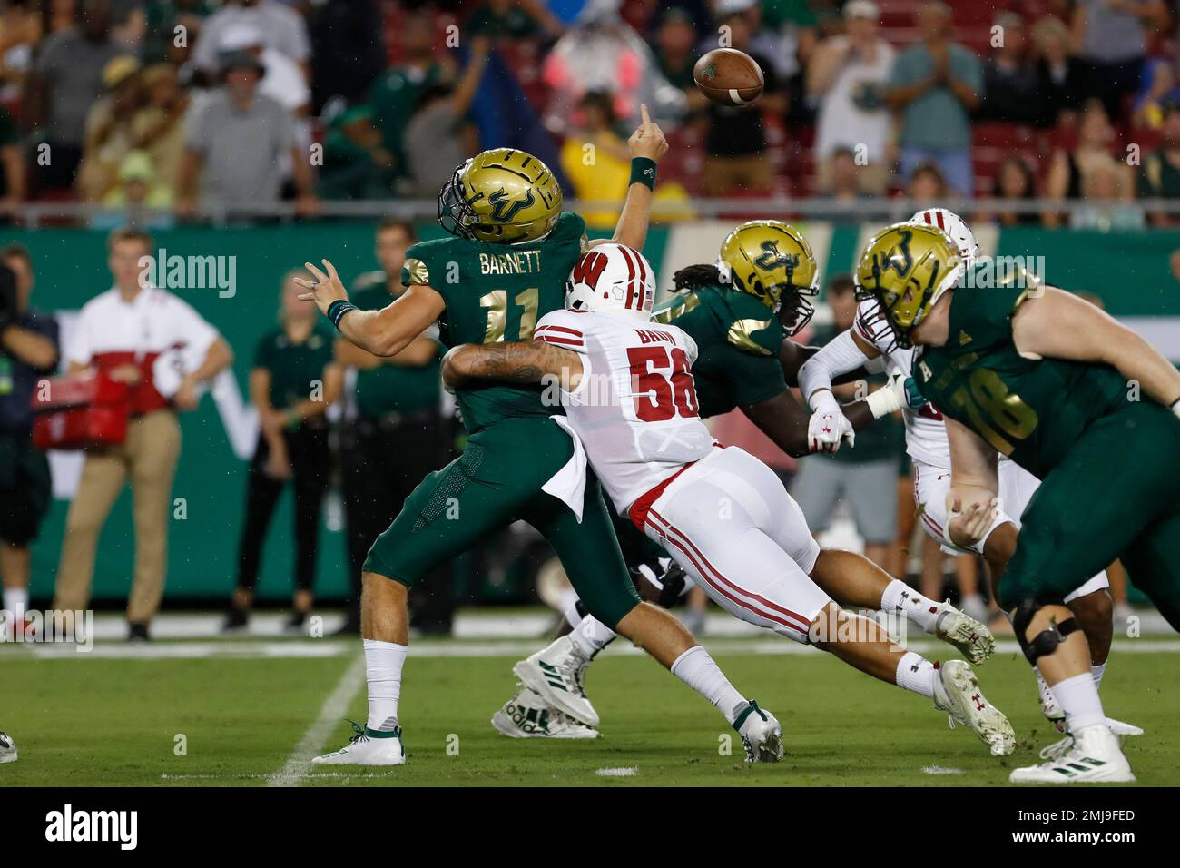 Wisconsin Badgers linebacker Zack Baun (56) hits South Florida Bulls ...