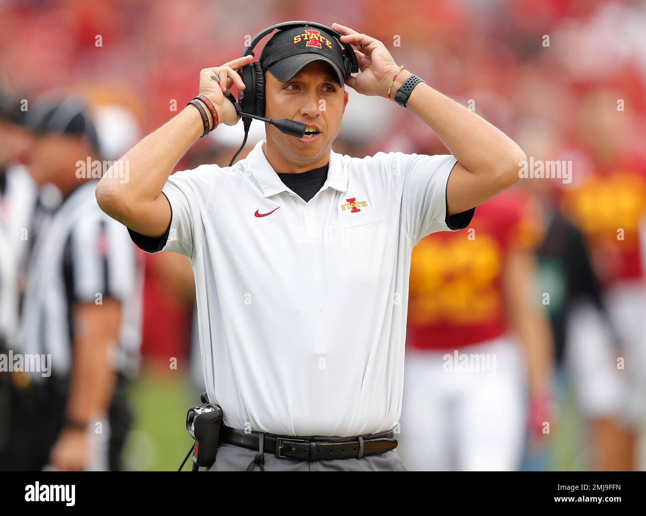 Iowa State head coach Matt Campbell adjusts his headset during the ...