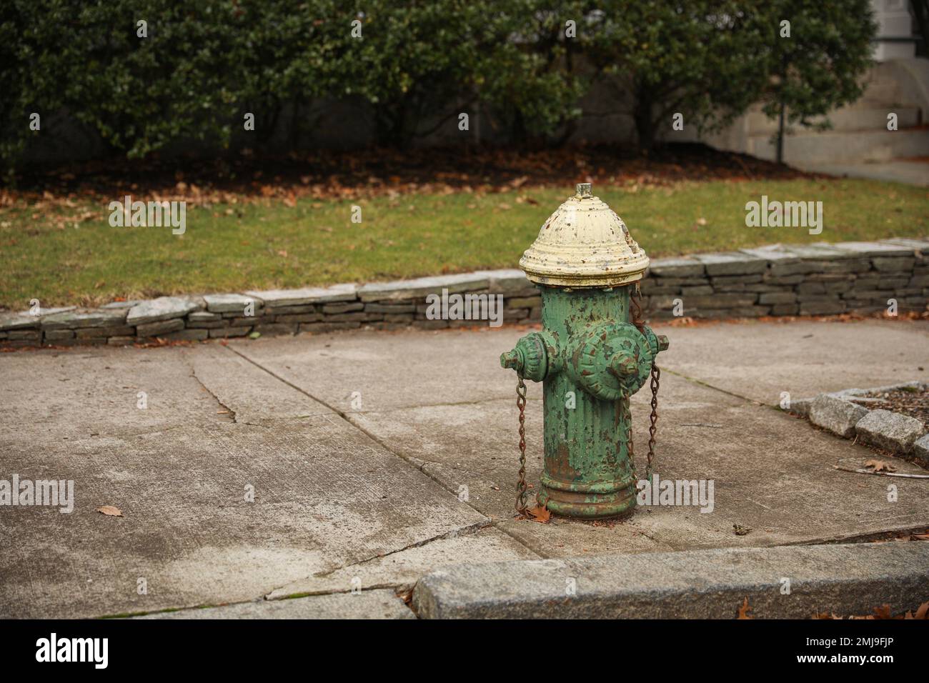 Old Fire Hydrant on the street stone cement sidewalk Stock Photo - Alamy