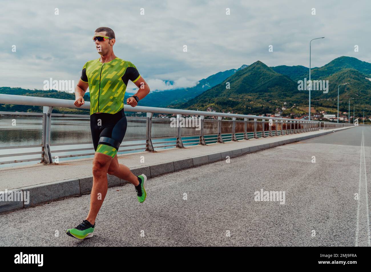An athlete running a marathon and preparing for his competition. Photo ...