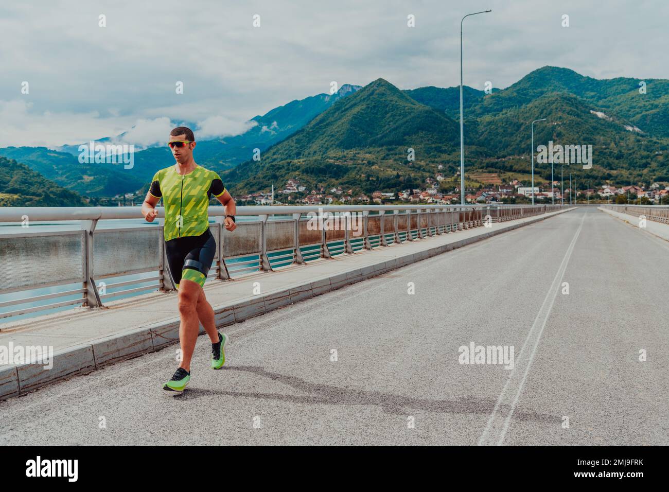 An athlete running a marathon and preparing for his competition. Photo ...