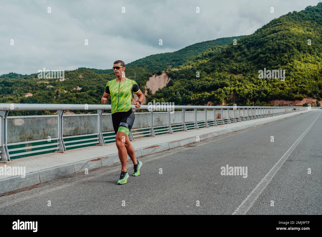 An athlete running a marathon and preparing for his competition. Photo ...