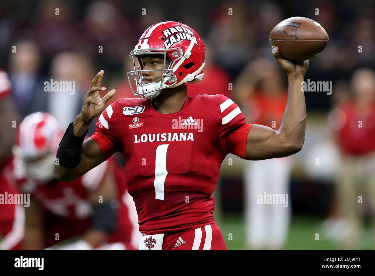 Louisiana-Lafayette quarterback Levi Lewis (1) throws a pass in the ...